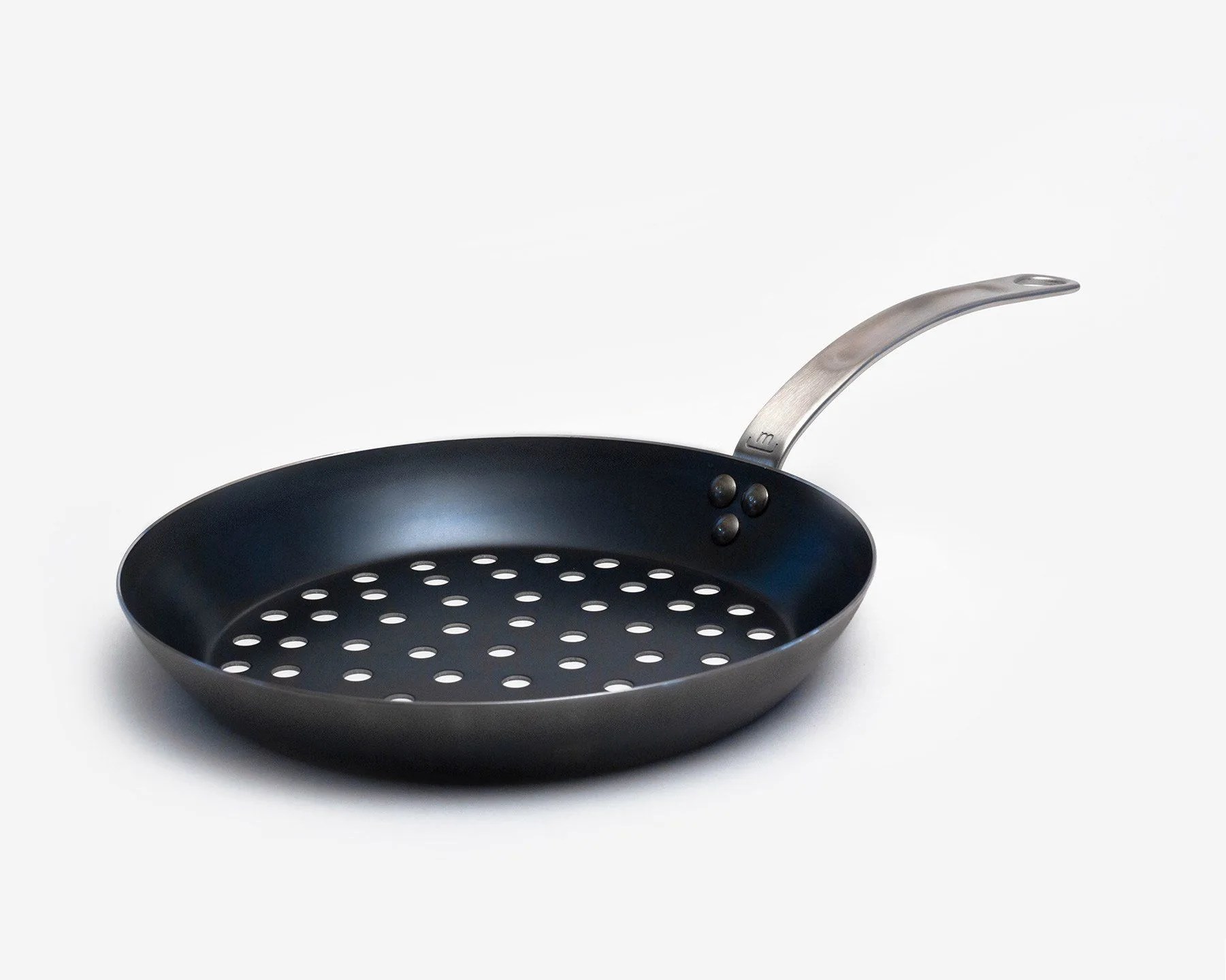 What Your Grilling Setup Is Missing: a Pan with Holes in It | Gear Patrol
