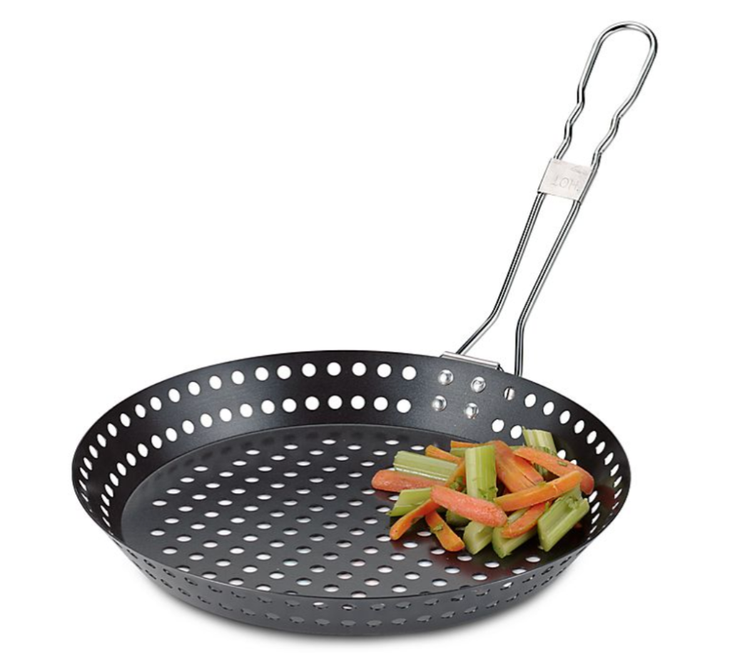 What Your Grilling Setup Is Missing: a Pan with Holes in It | Gear Patrol