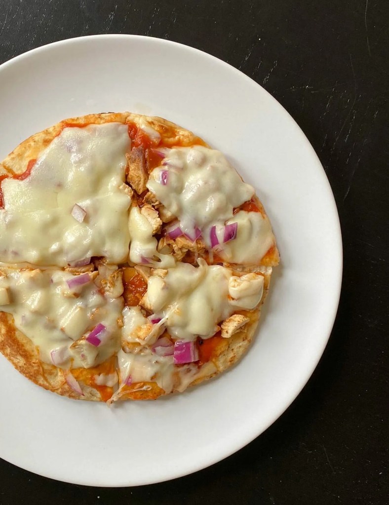 This Delicious Homemade Pizza Shreds Cheese — and Abs | Gear Patrol