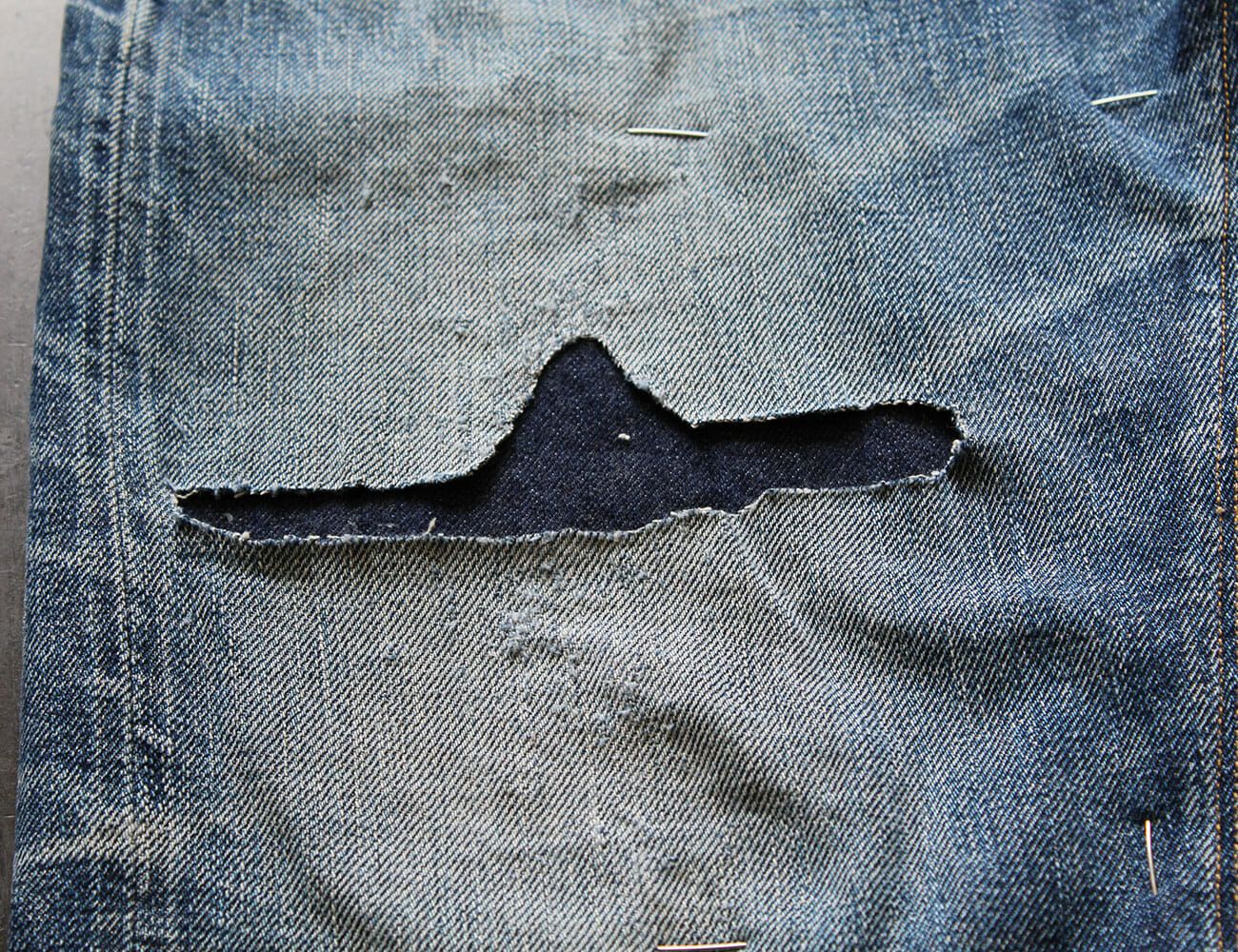 Bust Your Blue Jeans? Here's How to Patch Those Holes | Gear Patrol