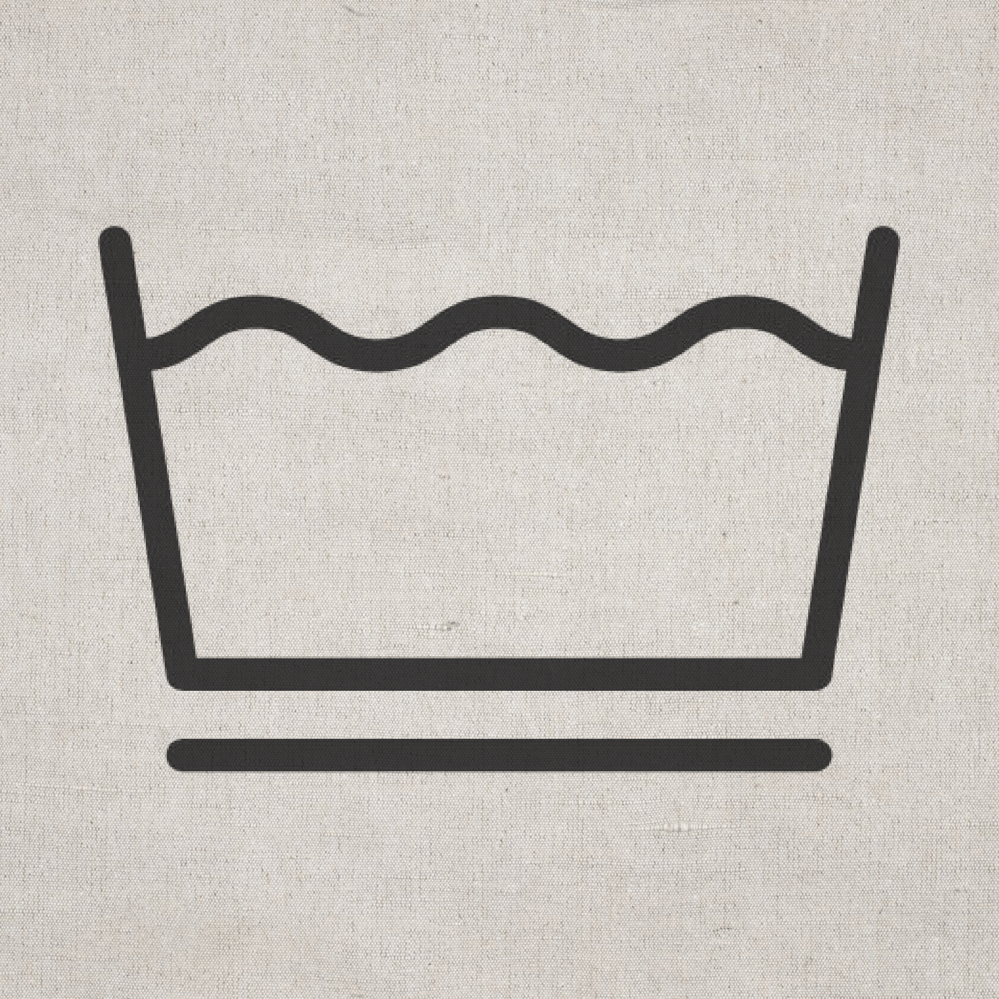 What Those Laundry Symbols on Your Clothes Really Mean