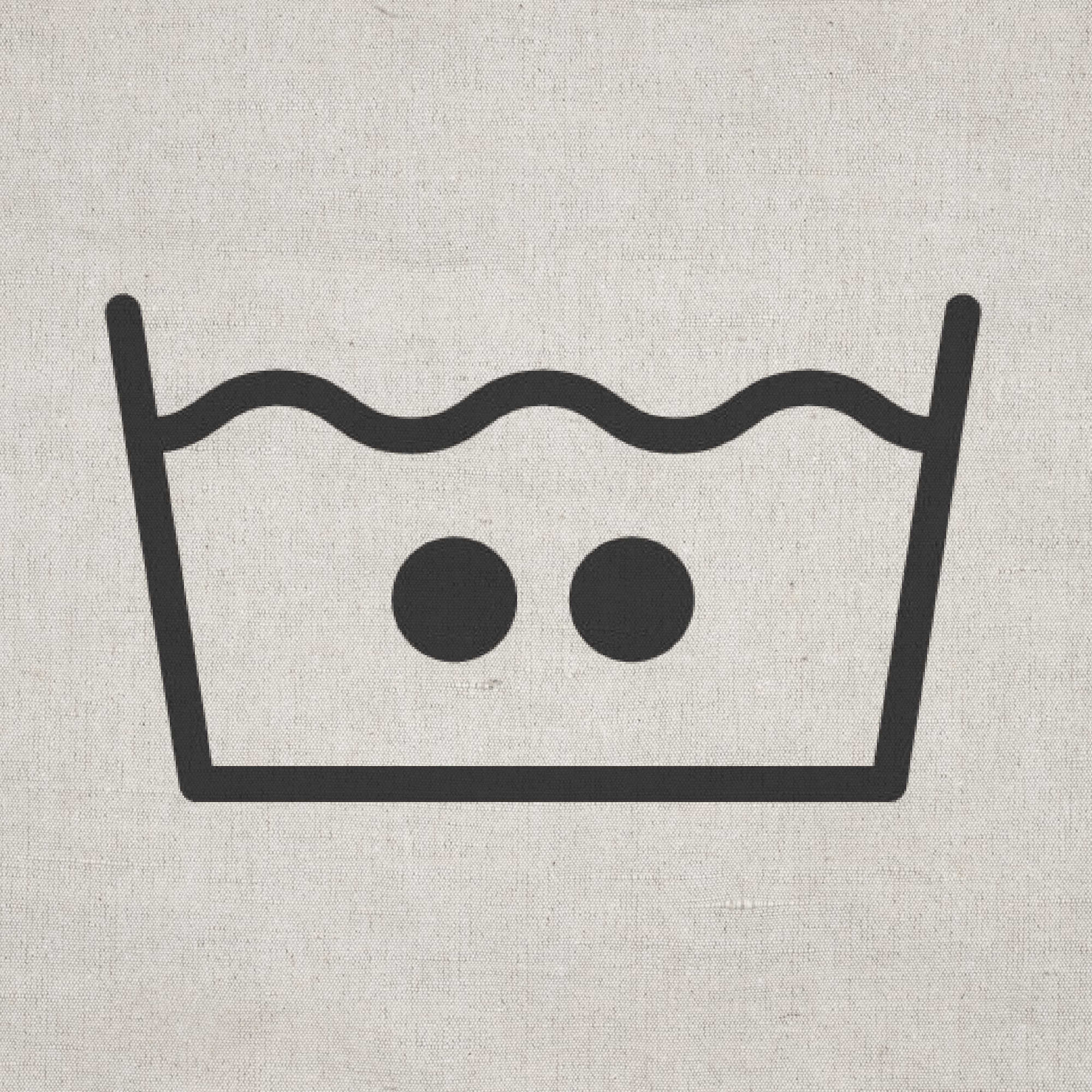 What Those Laundry Symbols on Your Clothes Really Mean