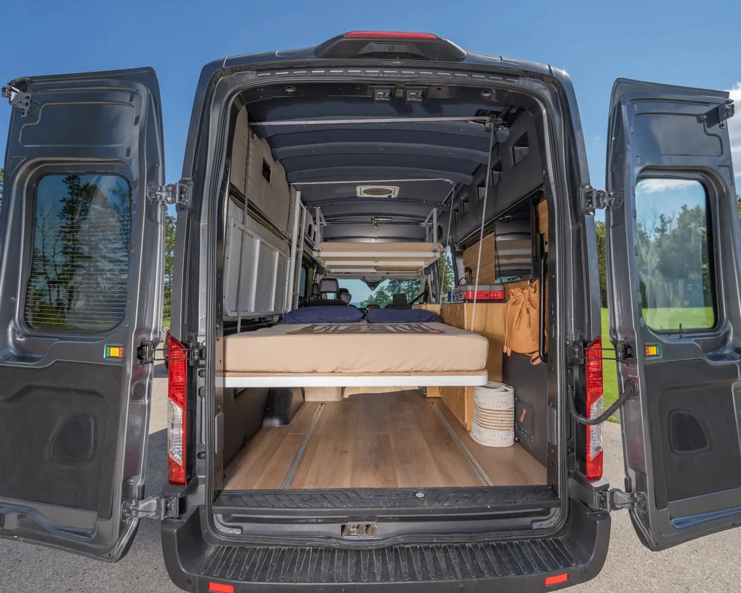This Clever Camper Van Sleeps Way More People Than the Footprint ...