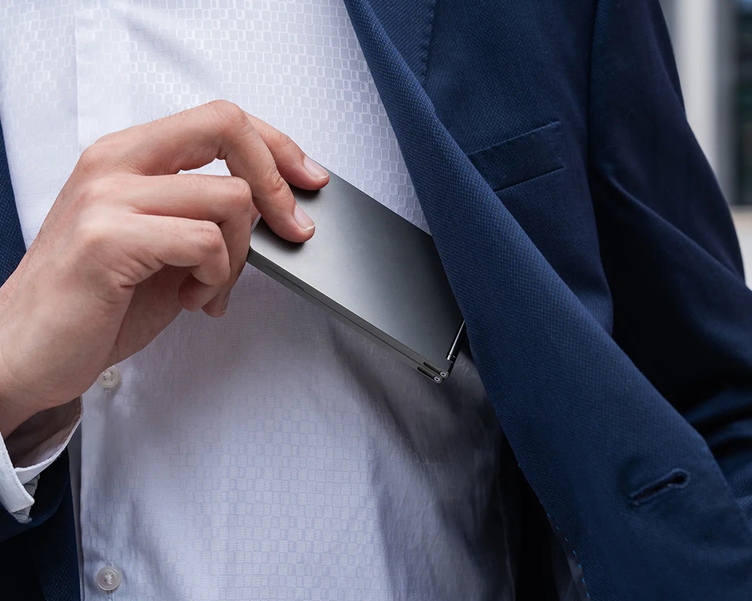 This Sleek Titanium EDC Wallet Is Secretly Packed with Handy Details ...